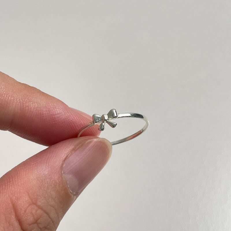 シルバー タイニー リボン リング / SILVER TINY RIBBON RING | アモンズ